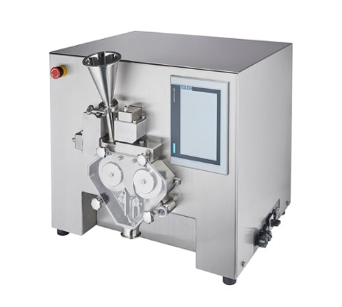 A True Lab-Scale Benchtop Roller Compactor